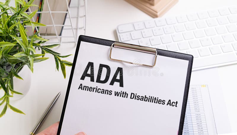 Paper with Americans with Disabilities Act ADA on a Table Stock Photo ...