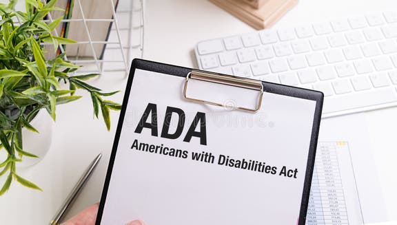 Paper with Americans with Disabilities Act ADA on a Table Stock Photo ...