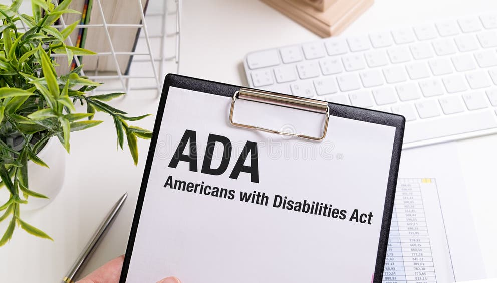 Paper with Americans with Disabilities Act ADA on a Table Stock Photo ...