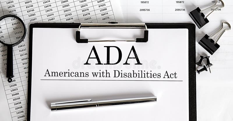 Paper with Americans with Disabilities Act ADA on a Table Stock Photo ...