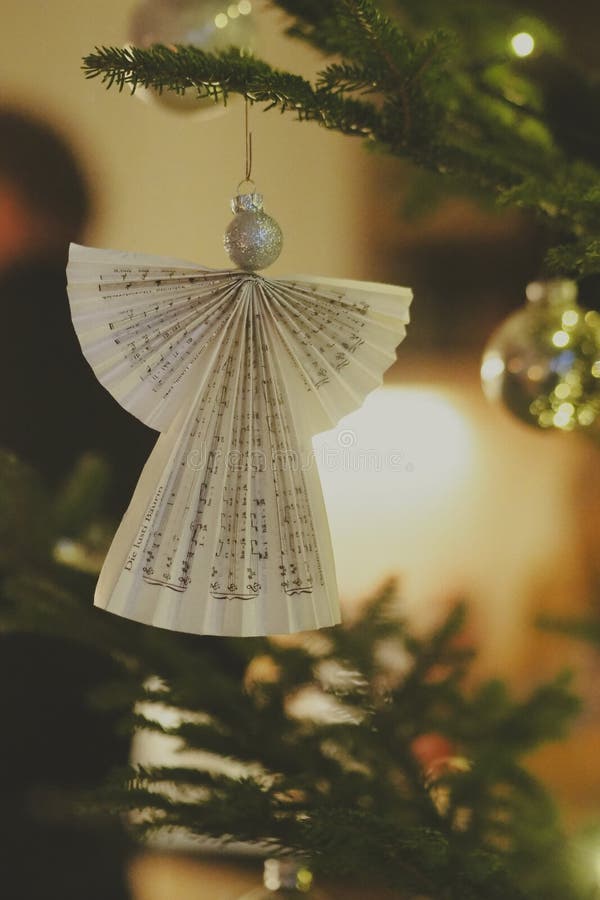 Paper Angel Ornament Hanging in a Christmas Tree Stock Photo - Image of ...