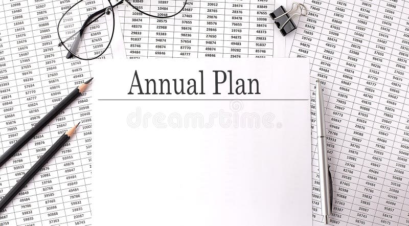 Paper with ANNUAL PLAN on a Table on Charts Stock Photo - Image of real ...