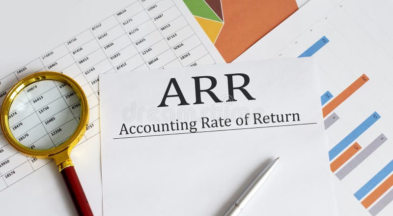 Paper with ARR ACCOUNTING RATE of RETURN on a Table with Charts, Pen ... Paper with ARR ACCOUNTING RATE of RETURN on a Table with Charts, Pen ...