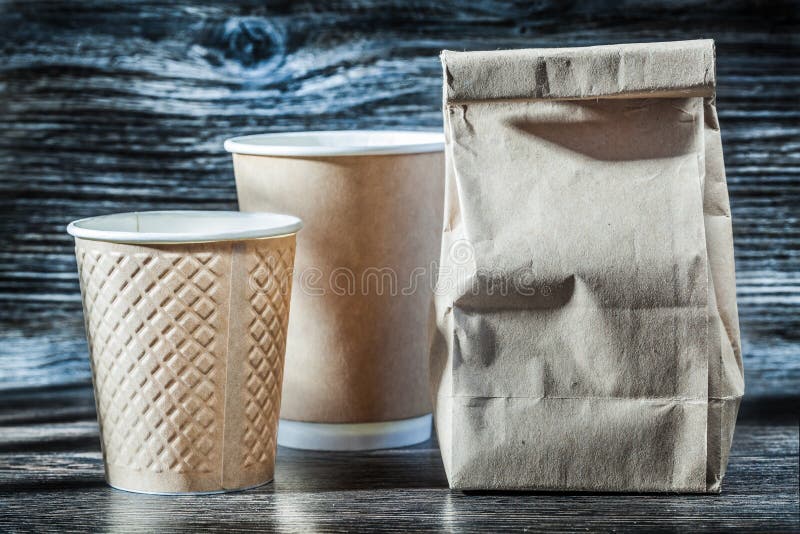 Paper Bag and Cups on Vintage Wood Stock Image - Image of grains ...
