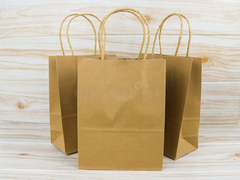 Paper Bag. Kraft Paper Shopping Bag. Brown Folded Paper Bag with Handle ...