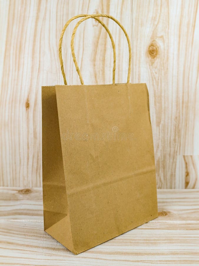 Paper Bag. Kraft Paper Shopping Bag. Brown Folded Paper Bag with Handle ...