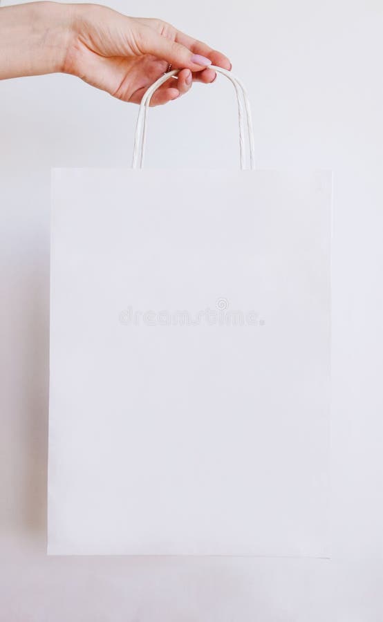Paper Bag on Light Background. Mockup for Design Stock Photo - Image of ...