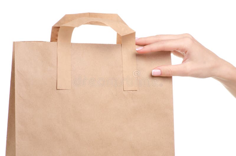 Paper bag package in hand stock image. Image of pack - 132287369