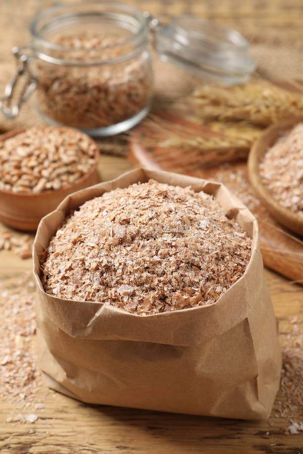 Paper Bag with Wheat Bran on Wooden Table Stock Image - Image of meal ...