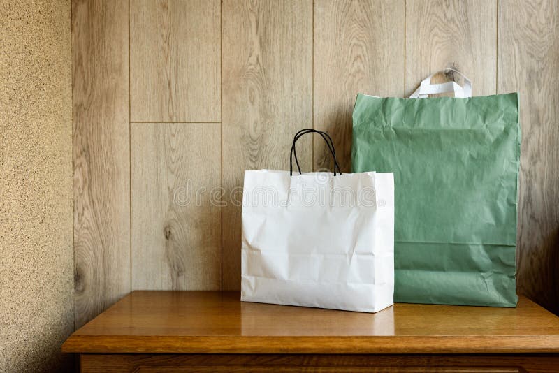 Paper Bags for Clothes in Dressing Room. Stock Image - Image of green ...