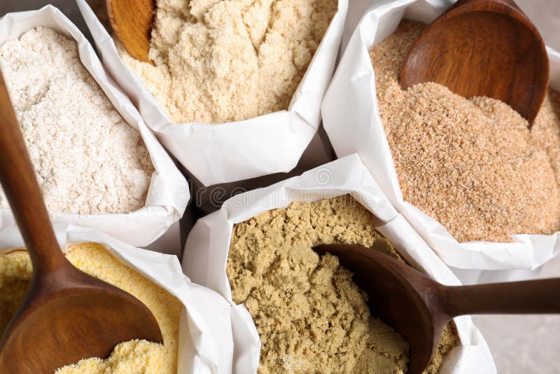 Paper Bags with Different Types of Flour and Wooden Spoons Stock Photo ... Paper Bags with Different Types of Flour and Wooden Spoons Stock Photo ...