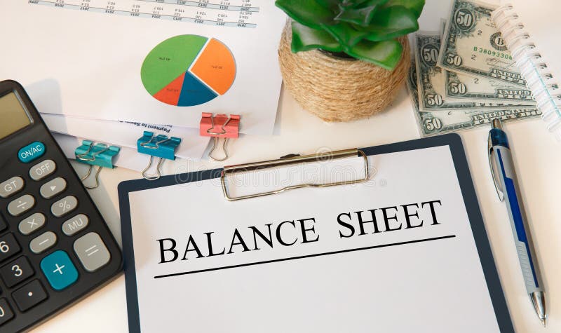 Paper with BALANCE SHEET on the Table, Calculator and Money Stock Photo ...