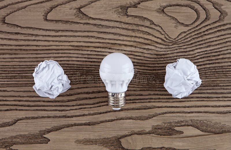Paper Balls and Light Bulbs on the Table Stock Image - Image of ...