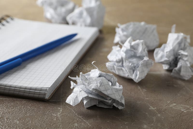 Paper Balls, Notebook and Pen on Grey Table Stock Photo - Image of ...
