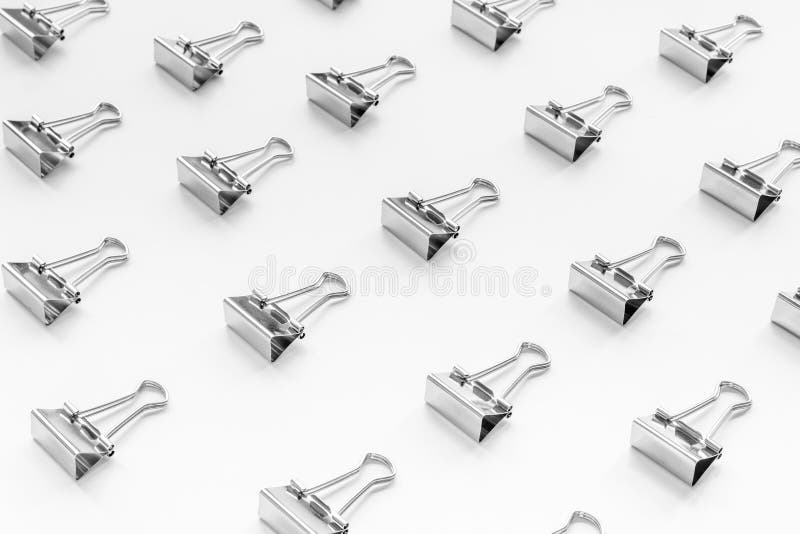 Stationery and Office Supplies Background. Paper Binder Clips Top View ...