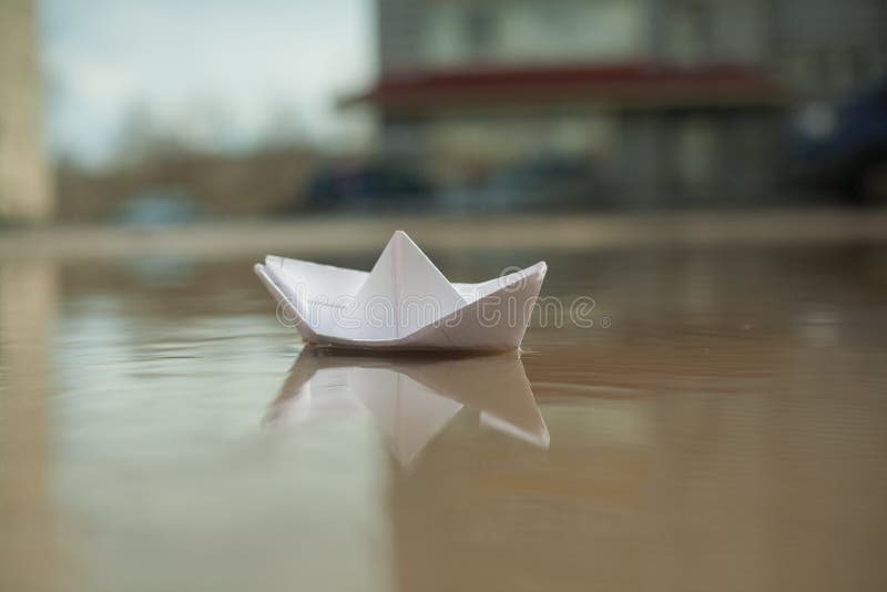 A Paper Boat Floats on the Water Stock Image - Image of horizontal ...
