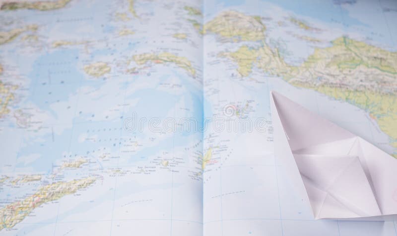 Paper boat on a map stock image. Image of cruise, driving - 48715999
