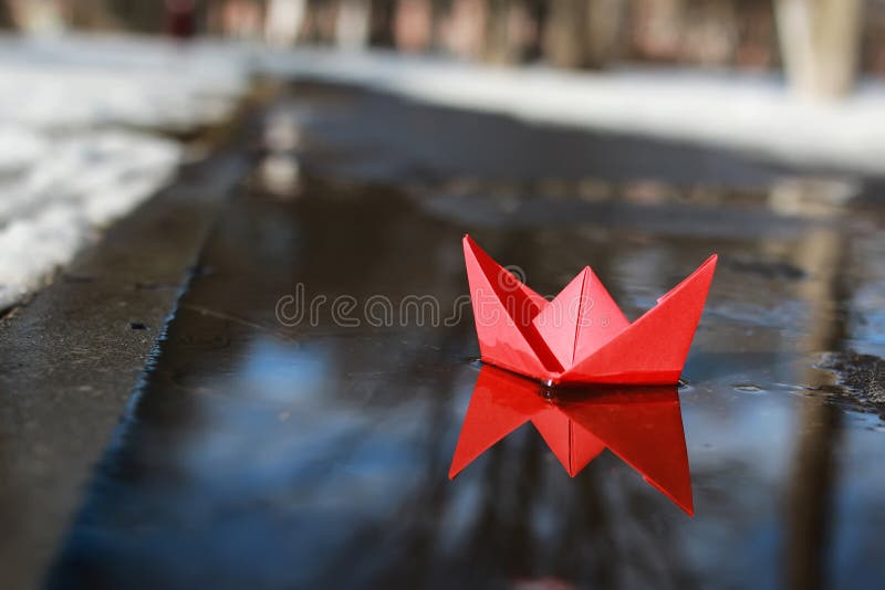 Paper boat in a pool stock image. Image of sailboat, bussines - 79104775
