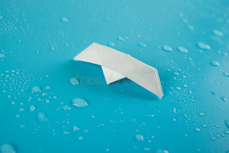 Paper Boat is Sinking into the Sea Stock Photo - Image of finance ...