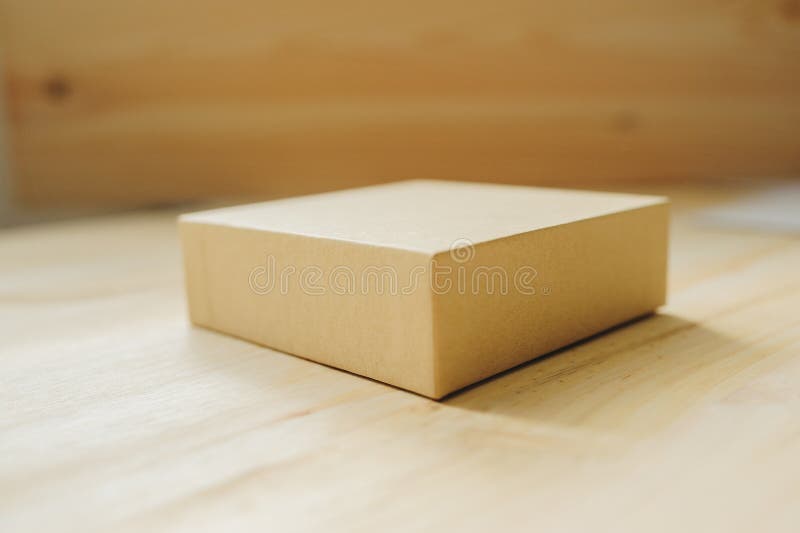 Paper Box on the Wood Desk Texture in Daylight Stock Photo - Image of ...