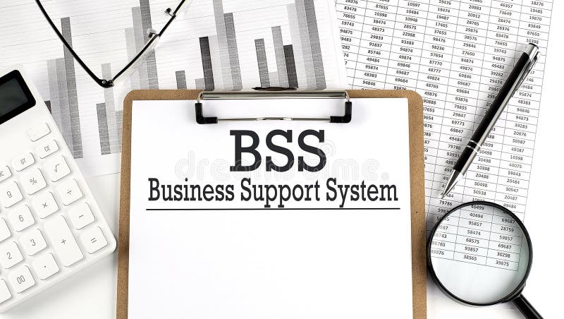 Paper with BSS - Business Support System on a Chart with Calculator,pen ...
