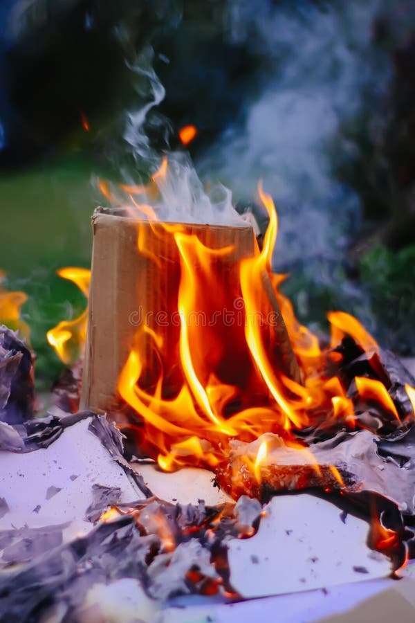 Paper burning outdoors stock image. Image of paper, outdoors - 128590087