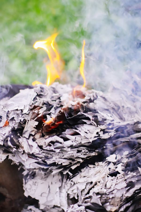 Paper burning outdoors. stock image. Image of burning - 128590695
