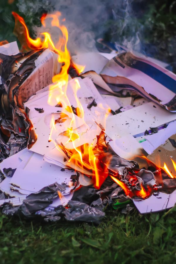 Notepad Burning on Green Summer Grass Outdoors. Stock Image - Image of ...