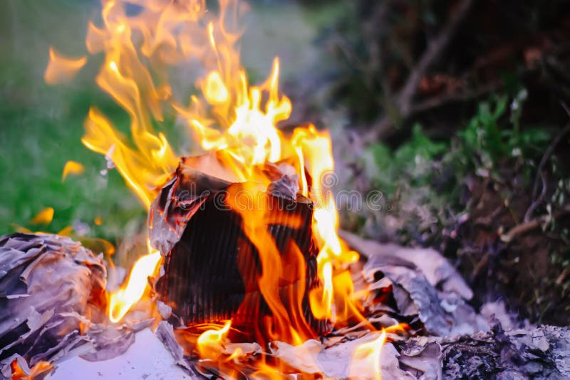 Paper burning outdoors stock image. Image of paper, outdoors - 128590087
