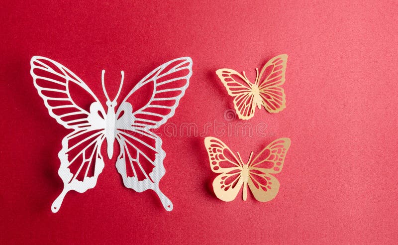 A Paper Butterfly Carve on a Red Background with Empty Space Stock ...
