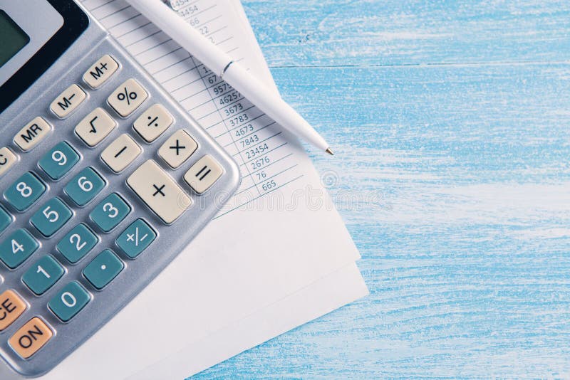 Paper and Calculator on the Table. Desktop Concept Stock Photo - Image ...