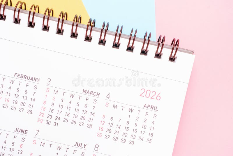 Paper Calendar for 2026 on Pink, Blue and Yellow Background Close-up ...