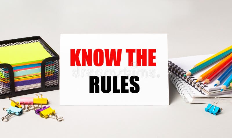 A Paper Card with the Text KNOW the RULES, Multi-colored Pencils ...