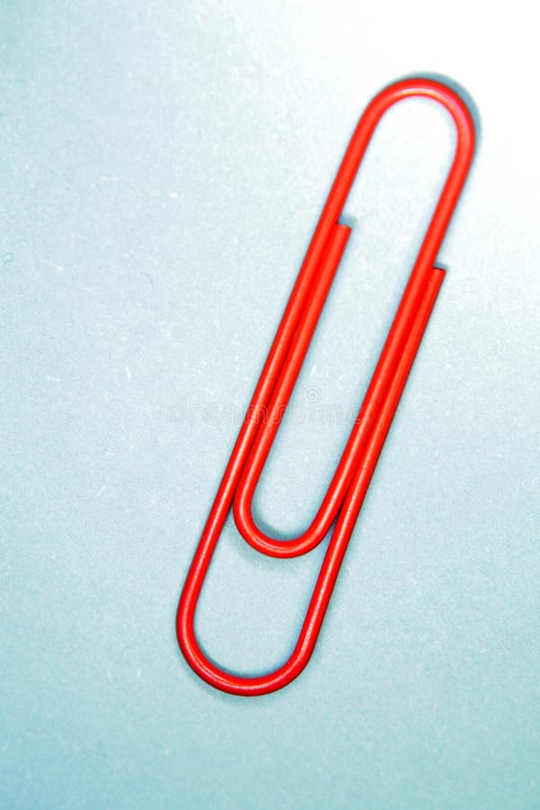 Red paper clip on papers stock photo. Image of background - 3075154