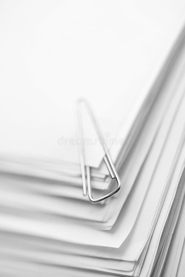 Paper Clip on a Stack of Papers Stock Photo - Image of stacked ...
