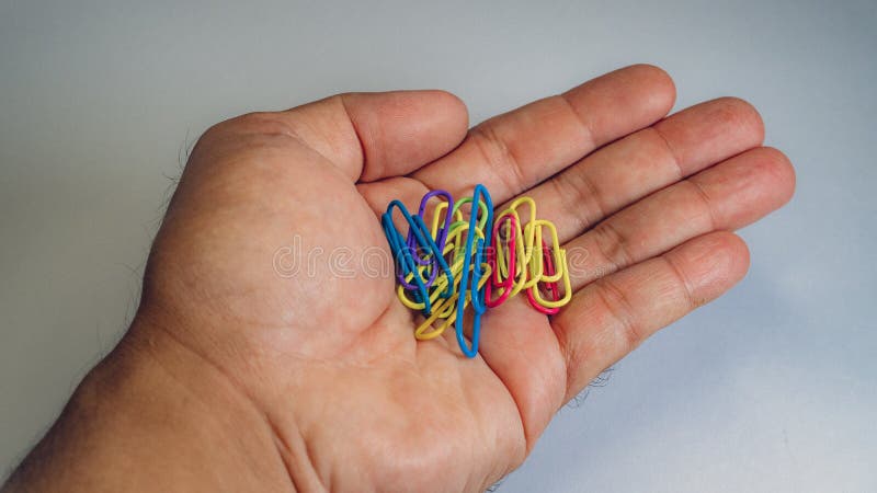 1,554 Paper Clips Hand Stock Photos - Free & Royalty-Free Stock Photos ...