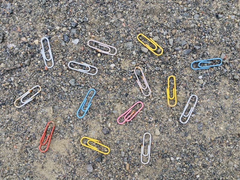Paper Clips Lie in the Sand Stock Photo - Image of clips, design: 224019510