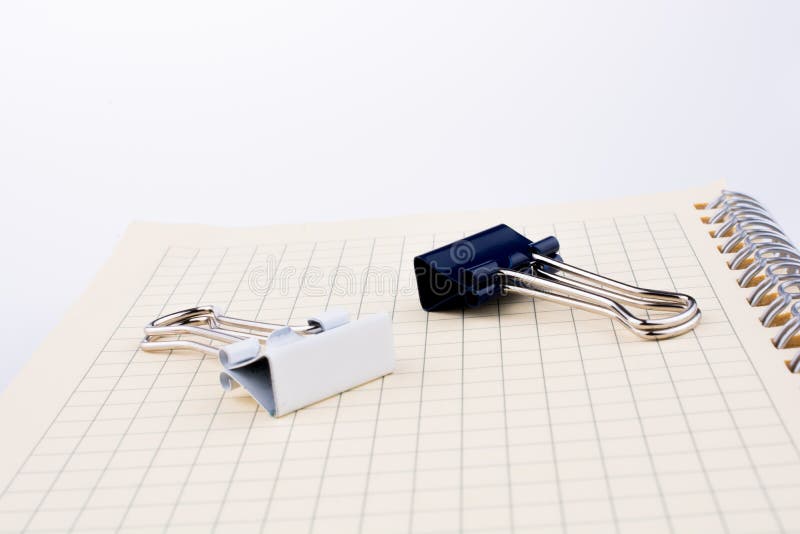 Paper Clips and notebook stock image. Image of attach - 118657851