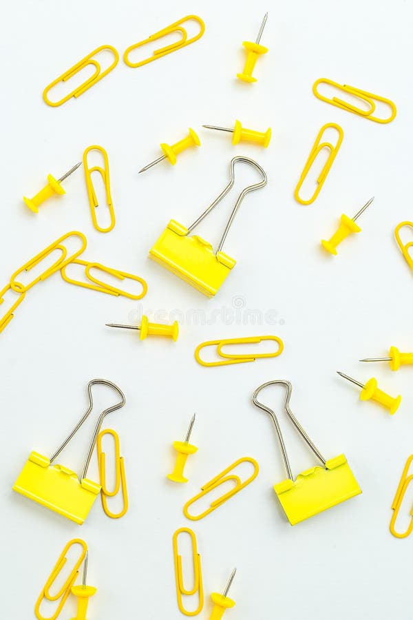 Yellow Paper Clips on a Blue Background. Vertical Format Stock Image ...