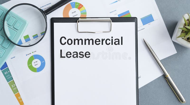 Paper with Commercial Lease on a Table with Chart Stock Image - Image ...