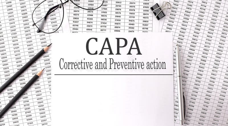Paper with Corrective and Preventive CAPA Action Plans on a Table Stock ...