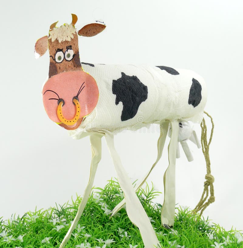 Paper cow on green grass stock image. Image of grass - 86610339