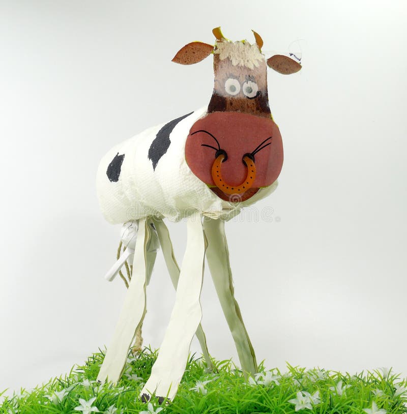Paper cow on green grass stock image. Image of grass - 86610339