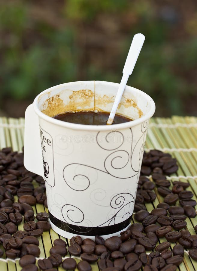Paper Cup of Black Coffee and Coffee Bean Stock Photo - Image of ...