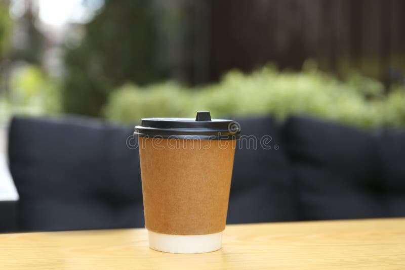 Paper Cup on Table in Outdoor Cafe. Coffee To Go Stock Image - Image of ...