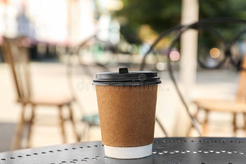 Paper Cup on Table in Outdoor Cafe. Takeaway Drink Stock Image - Image ...