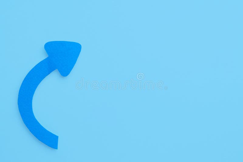 Paper Curved Arrow on Light Blue Background, Top View. Space for Text ...