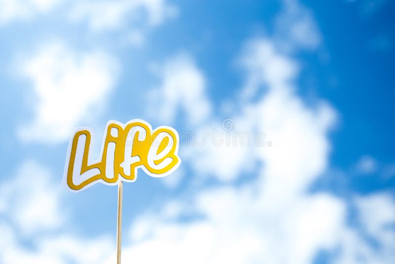 Paper Cut Word Life on Stick on Blue Sky Background Stock Image - Image ...