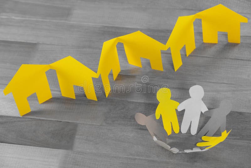Paper Cutout Figures Standing in Circle by Paper Houses Stock Image ...