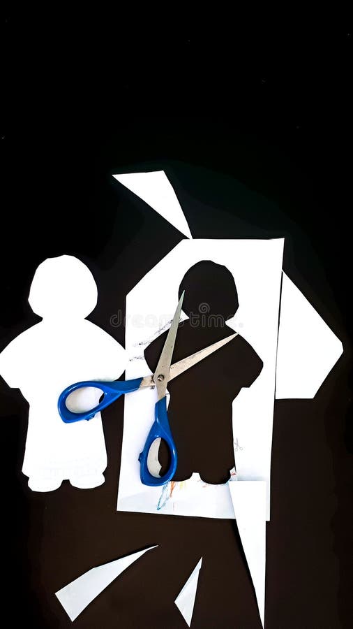 Paper Cutout, School Homework Cutting Out Paper Figure on Black ...